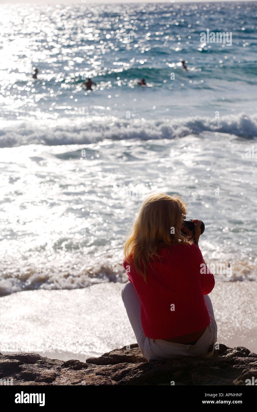 woman photographing surfers Stock Photo - Alamy