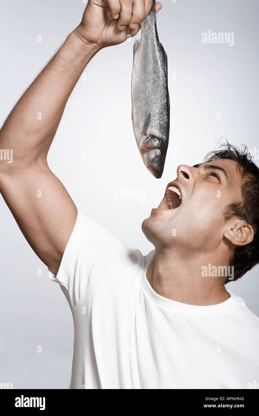 Man Eating Fish