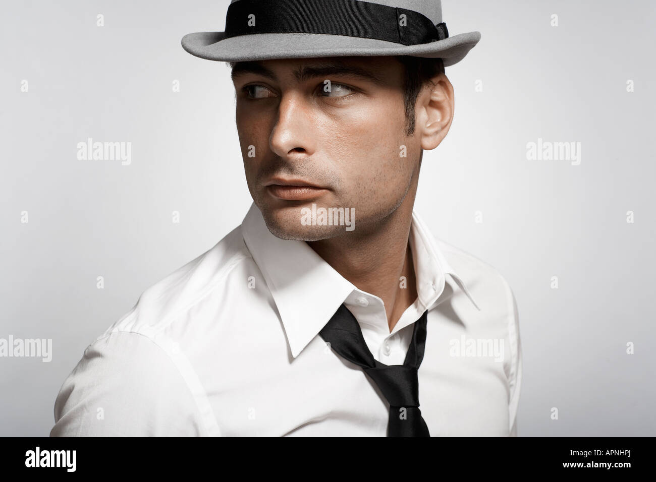 Mid adult man wearing fedora Stock Photo - Alamy