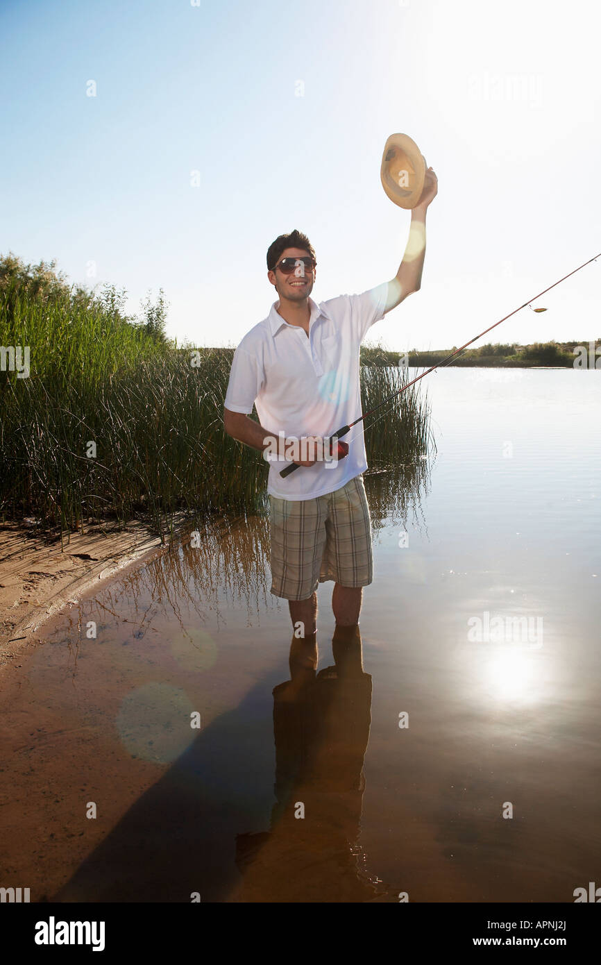 Hands lifting hat hi-res stock photography and images - Alamy