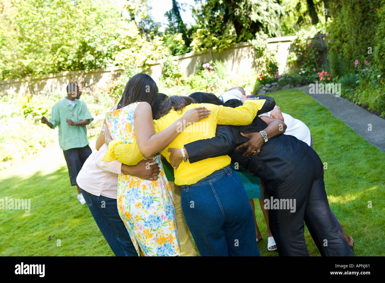Female family members hugging Stock Photo - Alamy