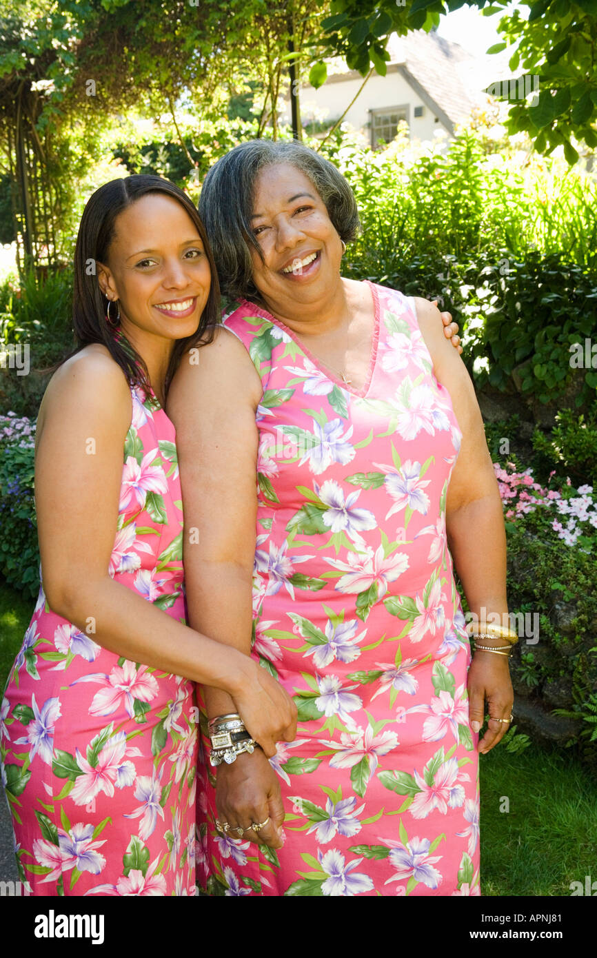 Two women posing together Stock Photo - Alamy