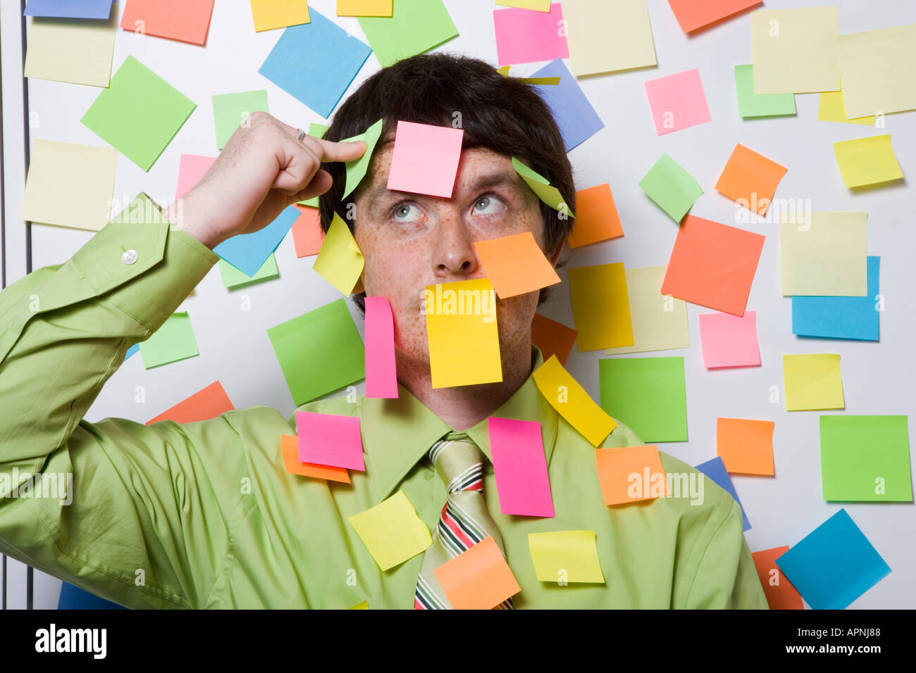 Male office worker covered with sticky notes Stock Photo - Alamy