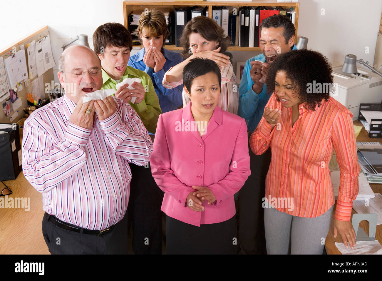 Co workers with colds Stock Photo - Alamy