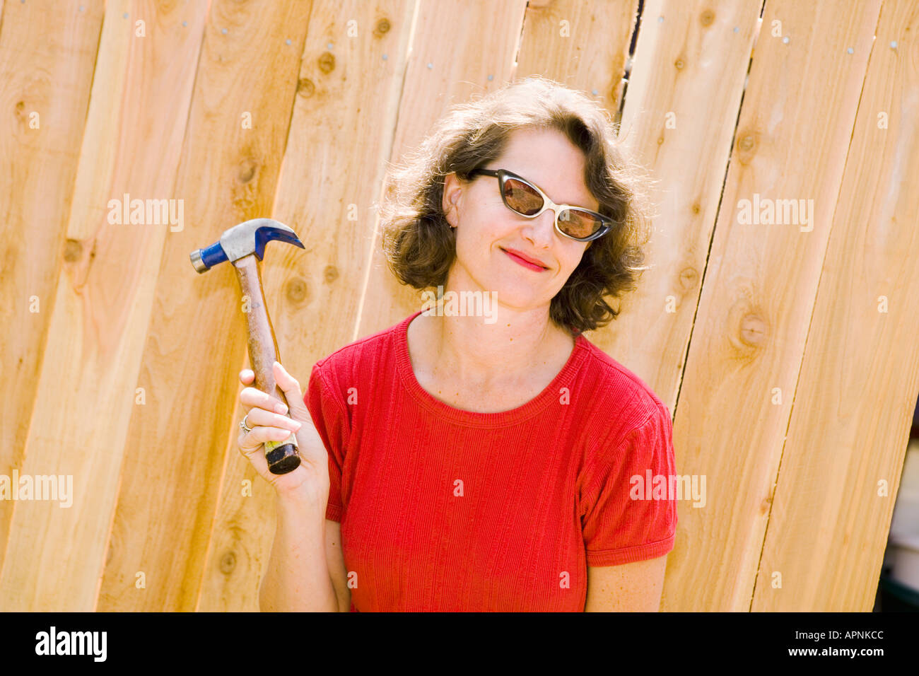 Hammer women hi-res stock photography and images - Alamy