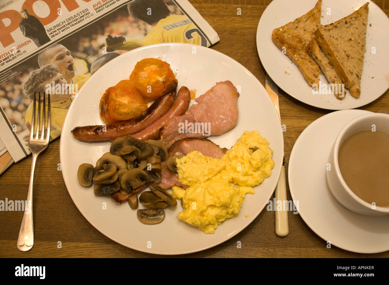 full english cooked breakfast bacon egg and sausage toast coffee tomato ...