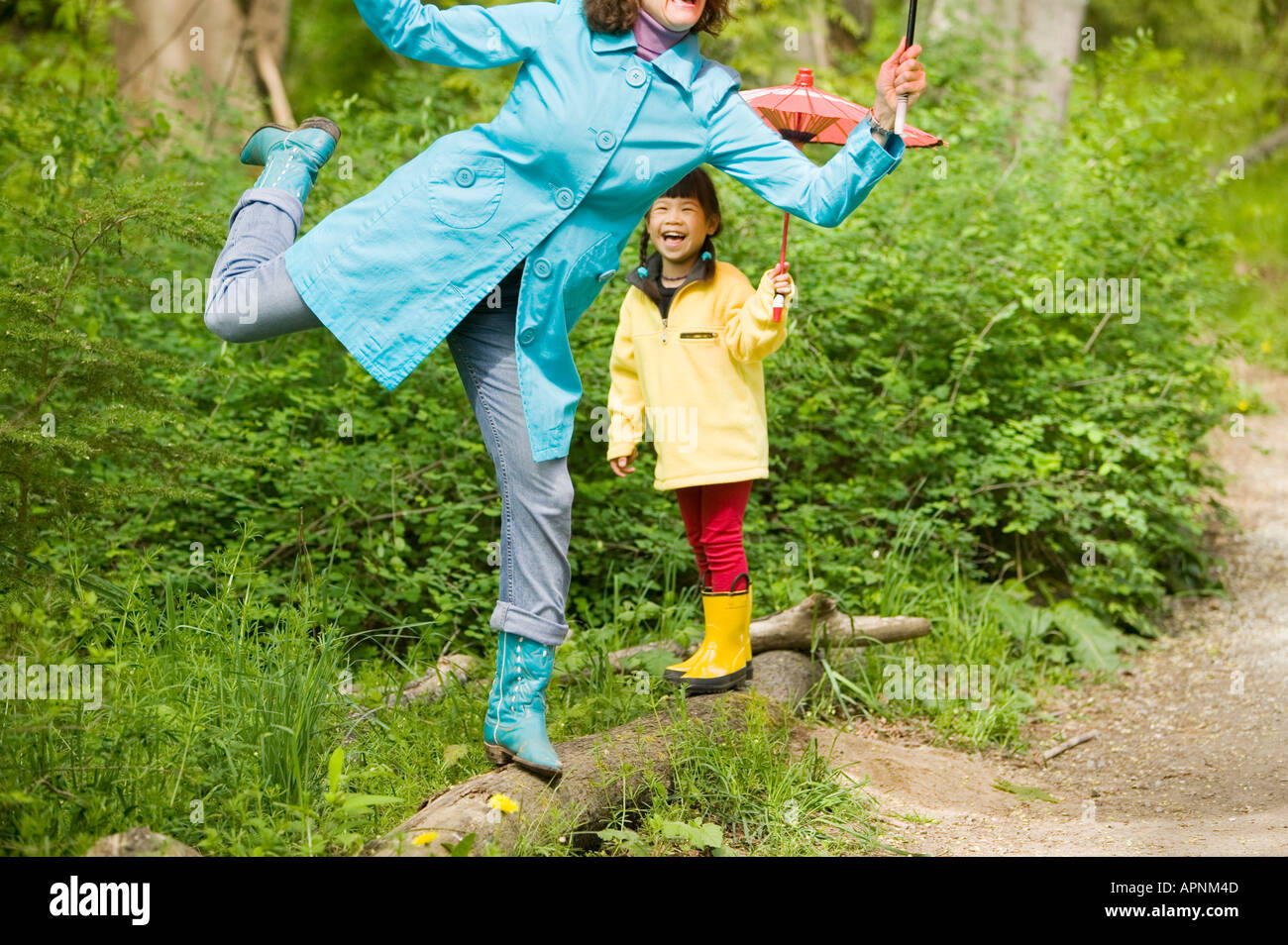 Adult female log balancing hi-res stock photography and images - Alamy