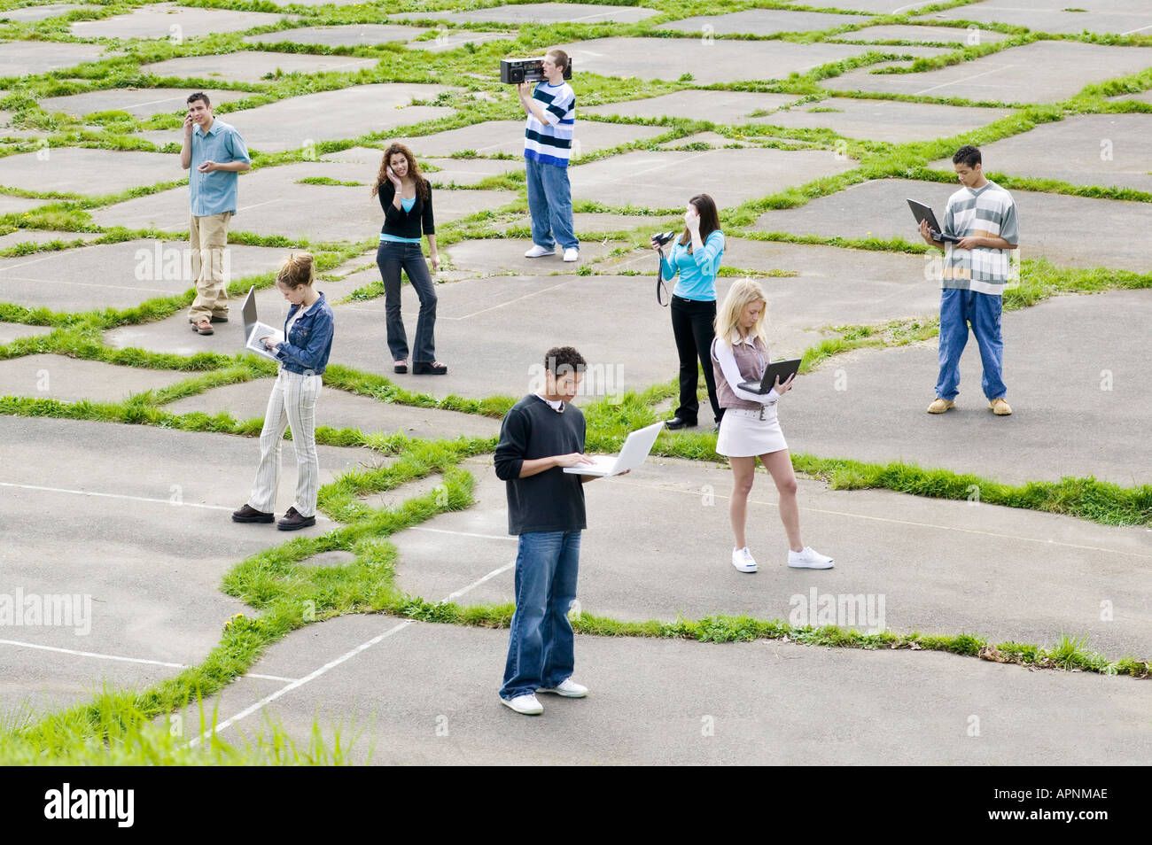 Teenagers using electronic gadgets Stock Photo - Alamy