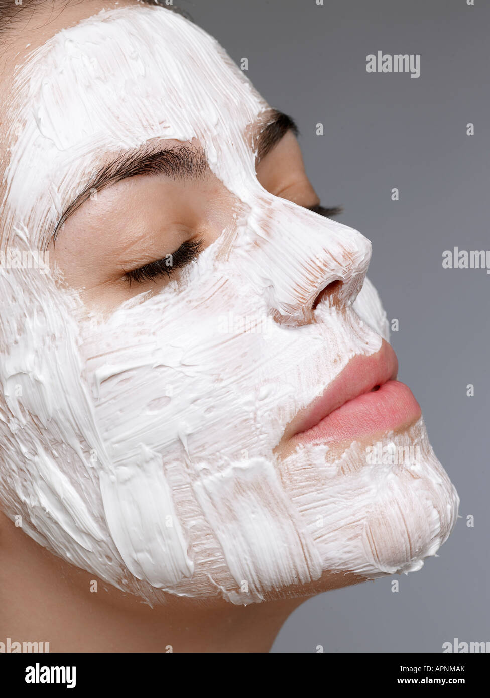Face covered up by mask one side hi-res stock photography and images ...