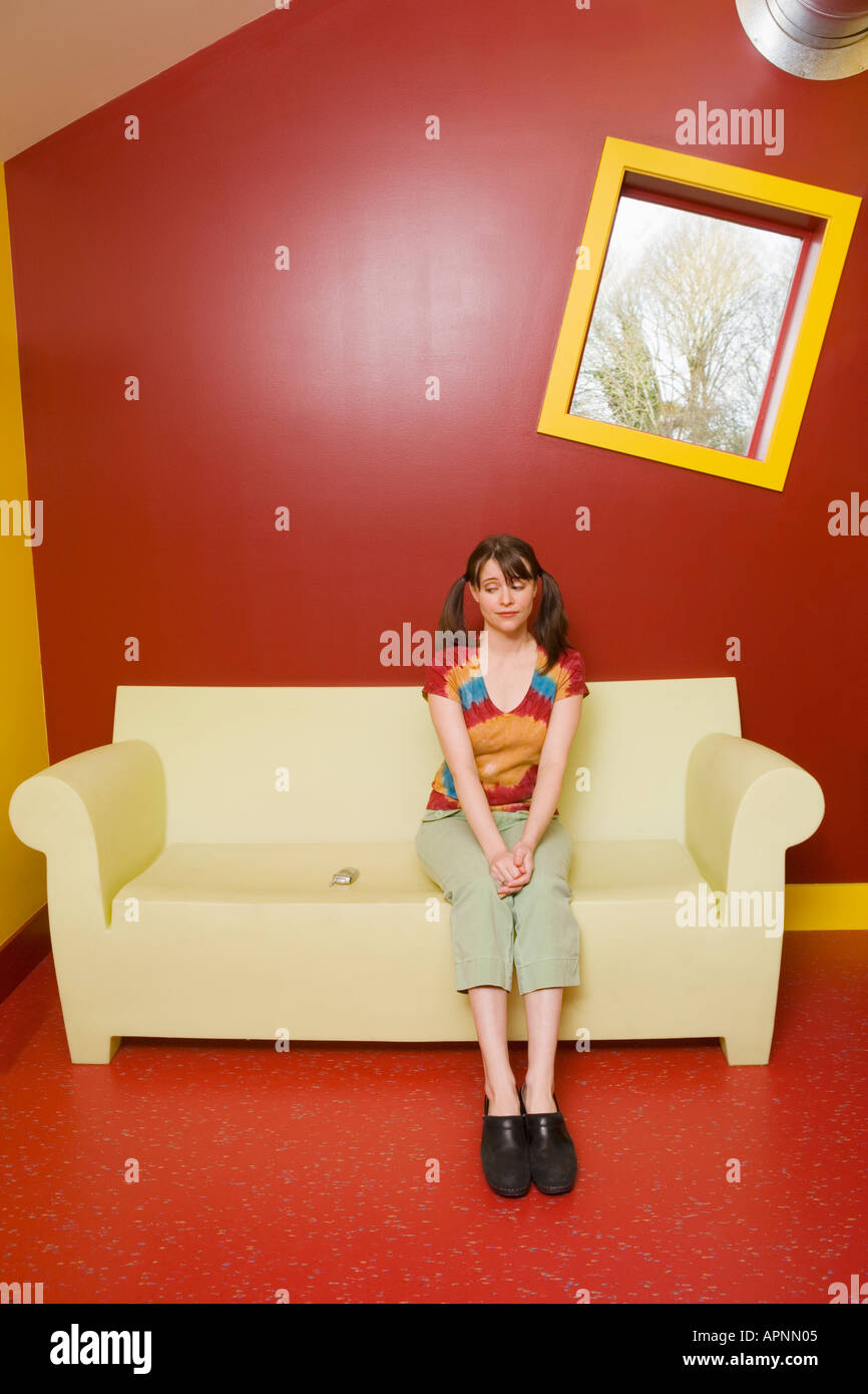 Girl waiting for the phone to ring Stock Photo - Alamy