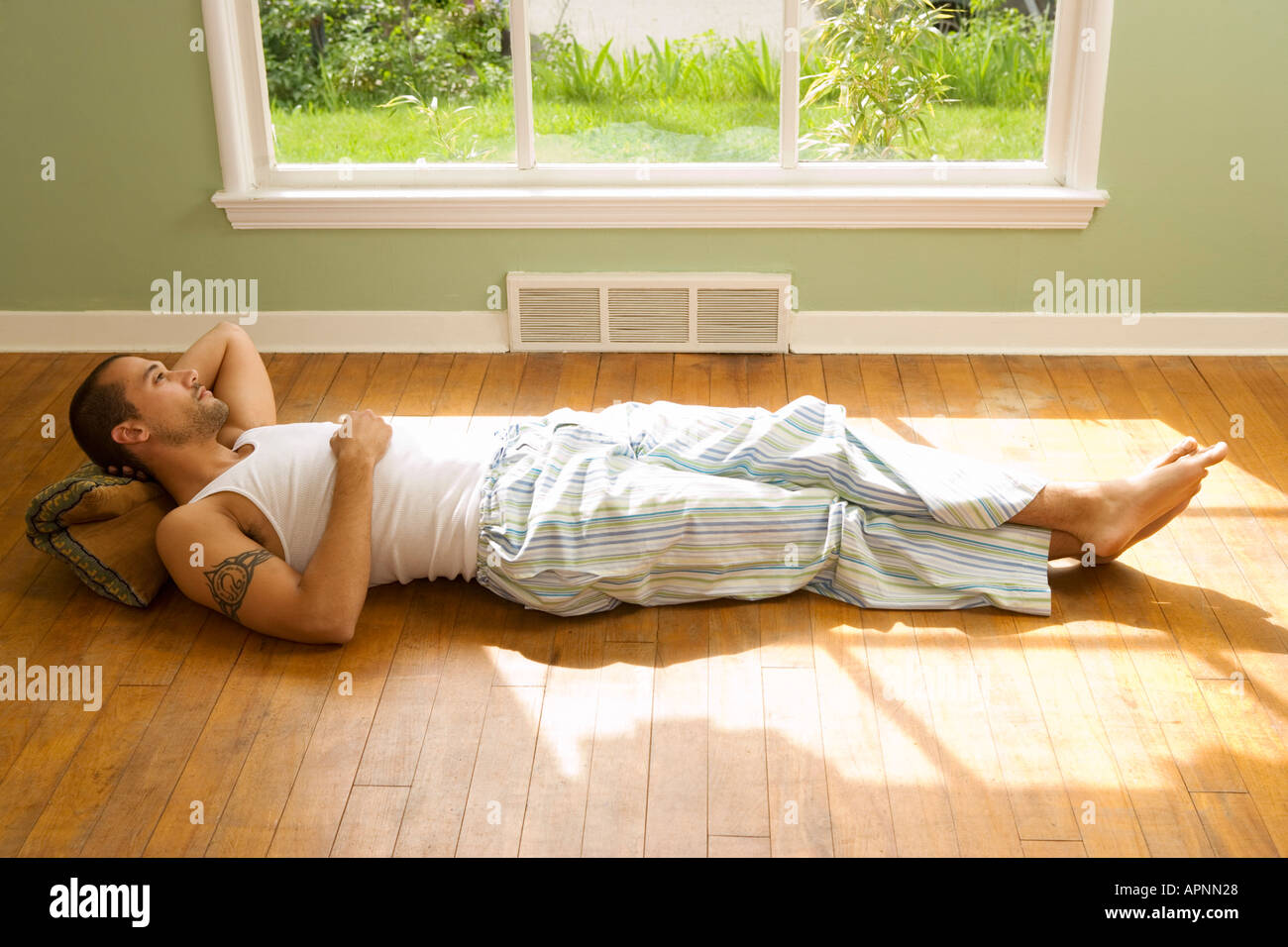 L lying on back hi-res stock photography and images - Alamy