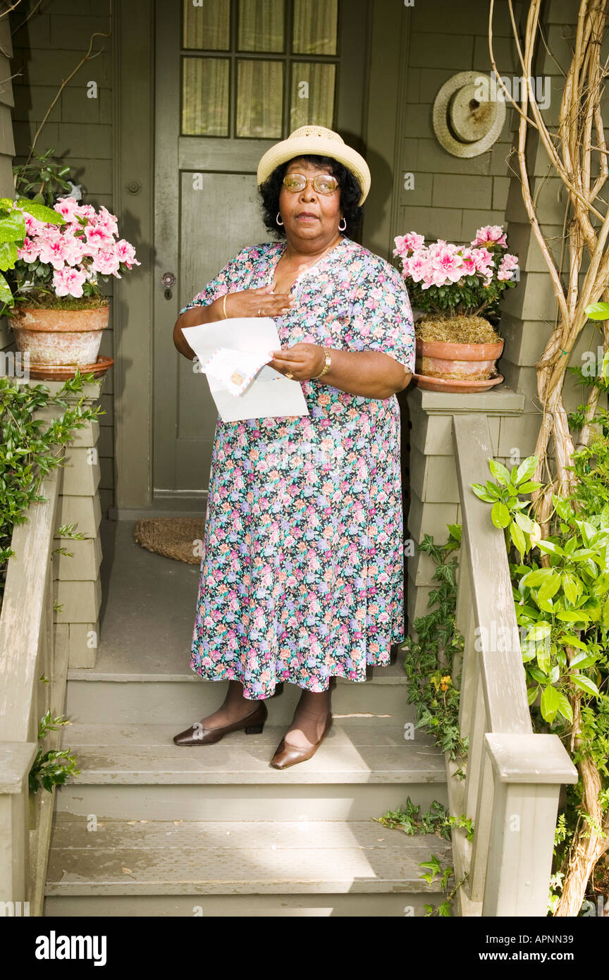 Old woman post letter hi-res stock photography and images - Alamy