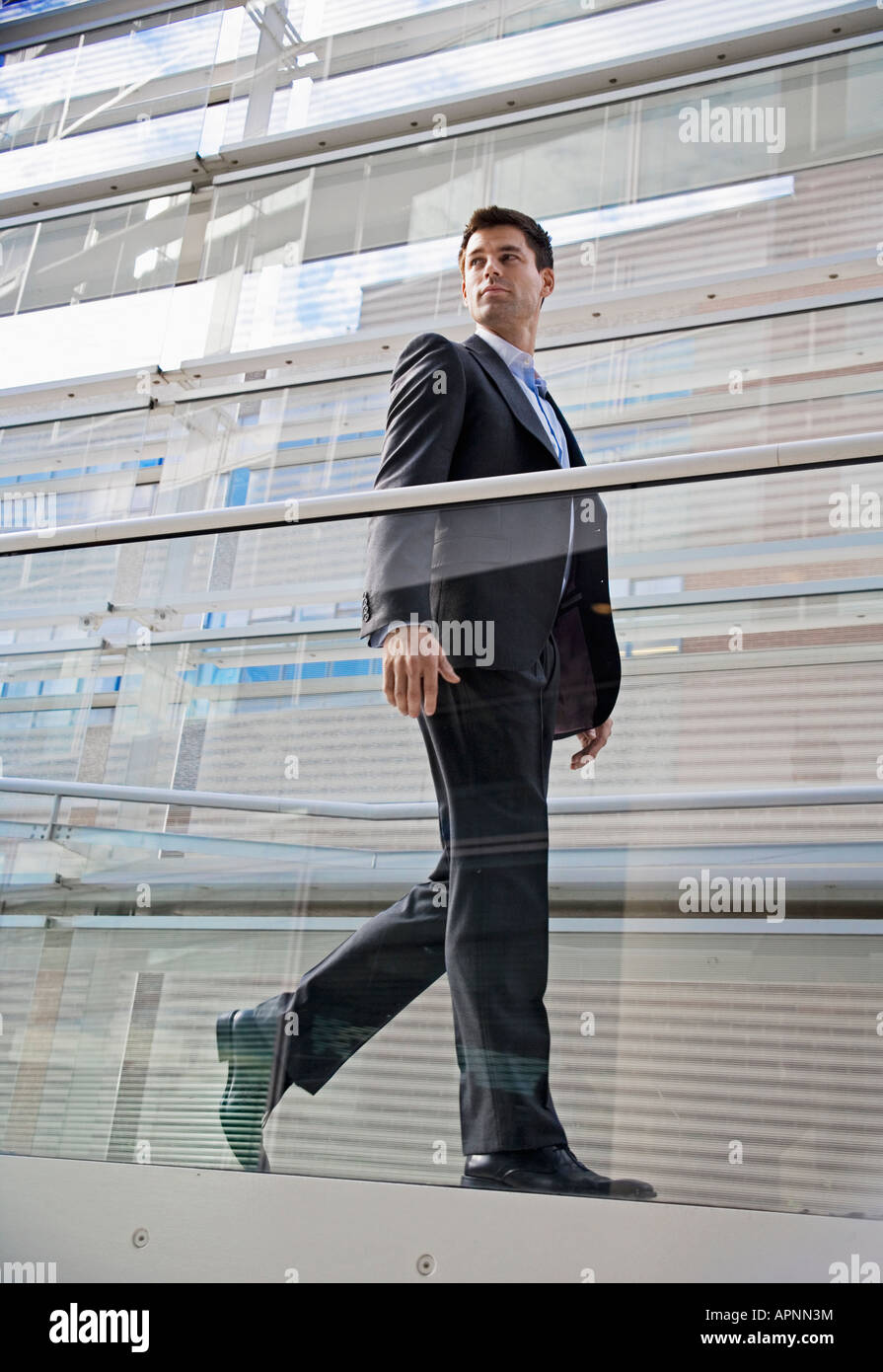 Businessman Walking on Ramp Stock Photo - Alamy