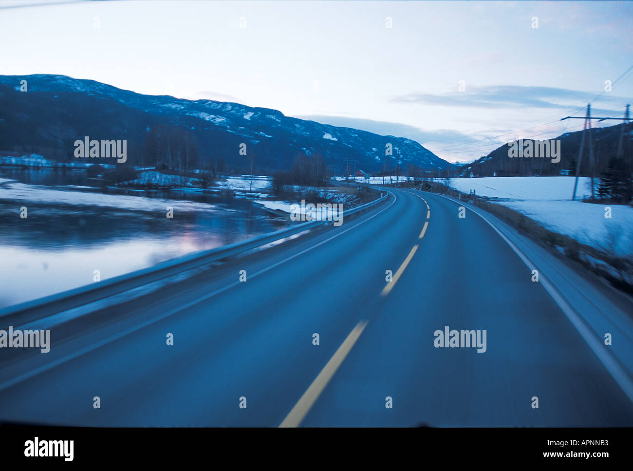 Dividing line on road in arctic landscape, Norway Stock Photo - Alamy
