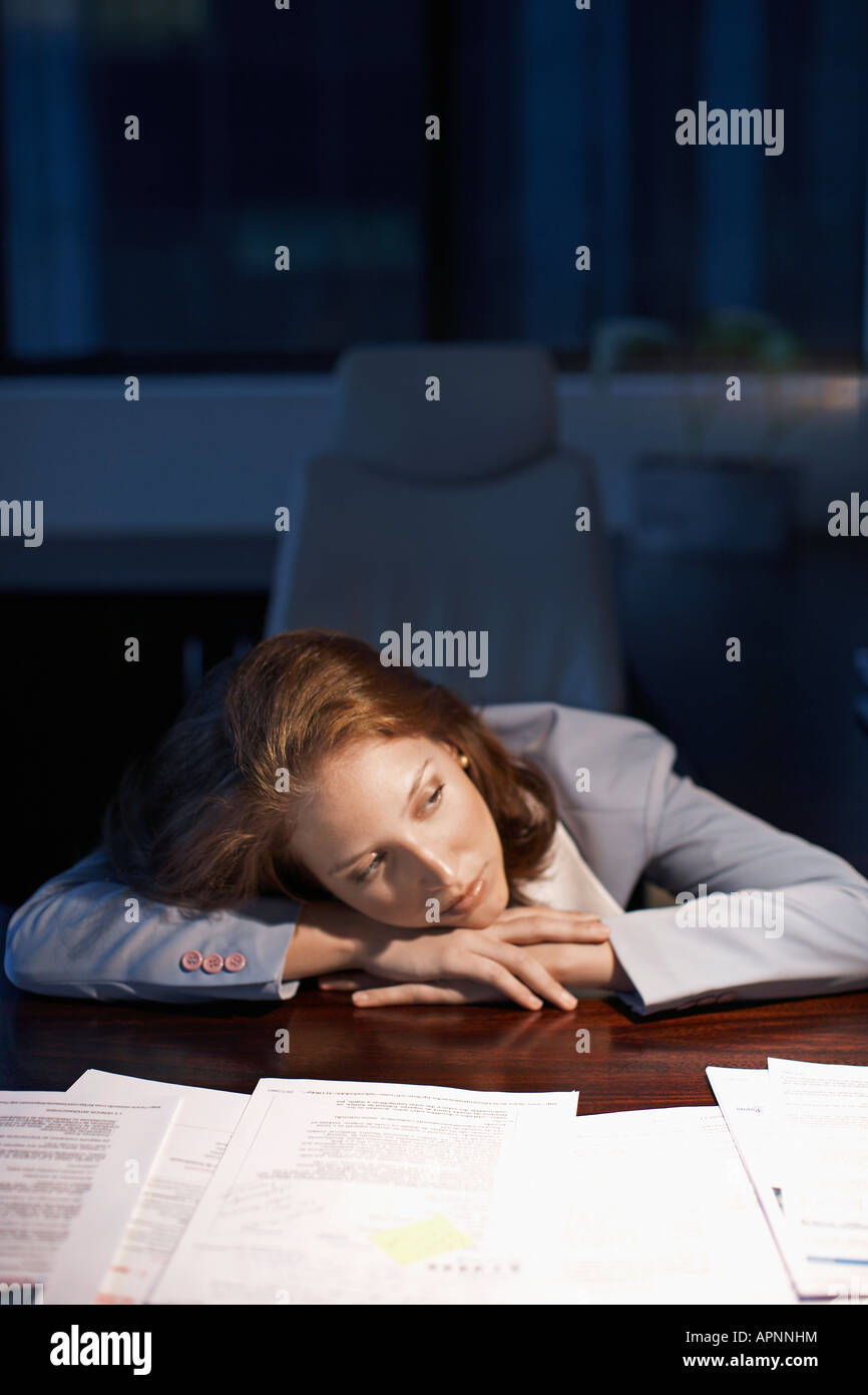 Young Woman Working Late Stock Photo - Alamy