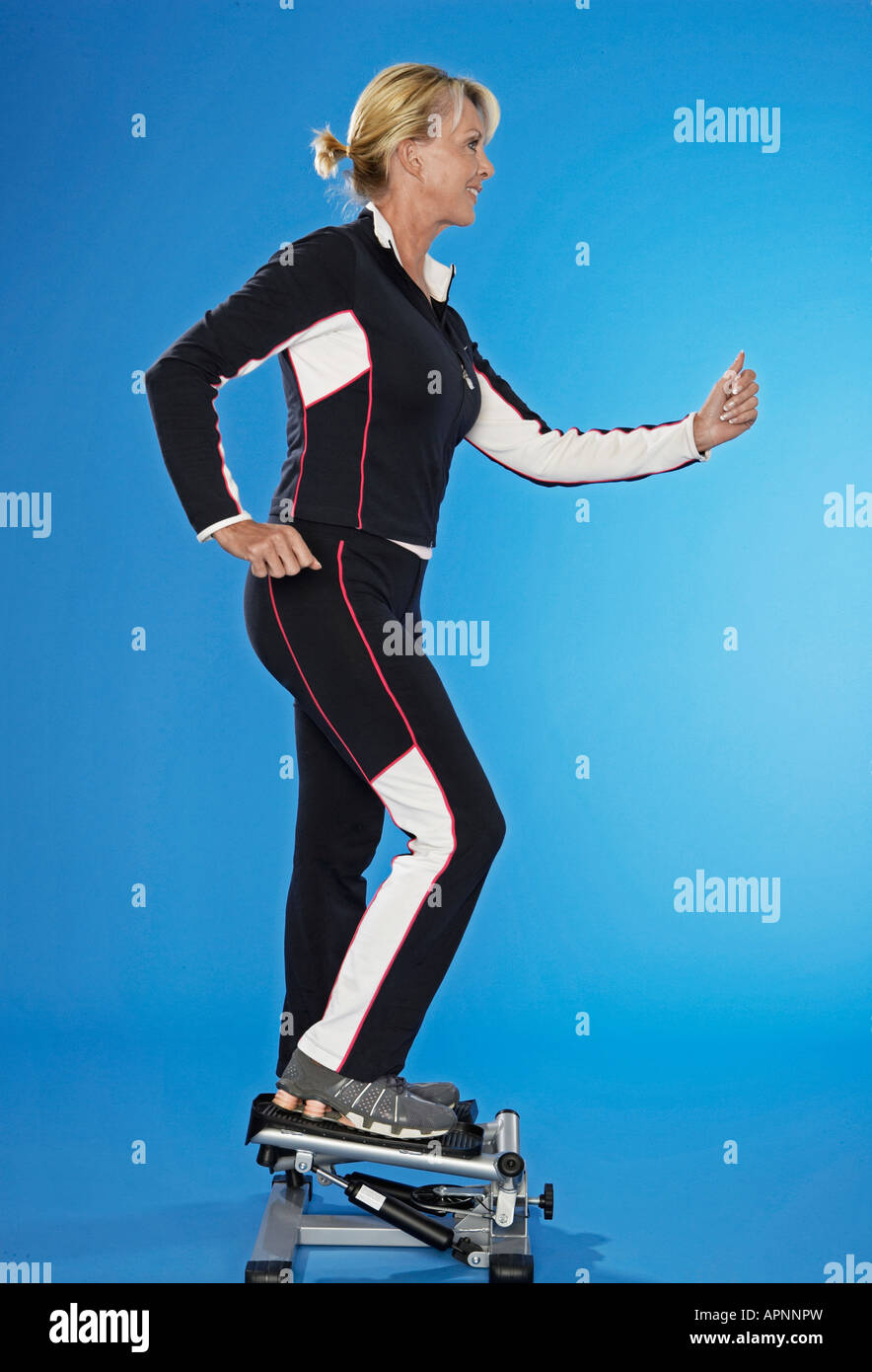 Mature Woman on Step Machine Stock Photo - Alamy
