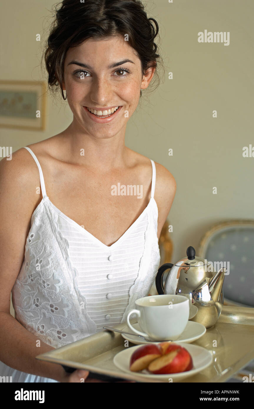 Young Woman Carrying Food Tray Stock Photo - Alamy