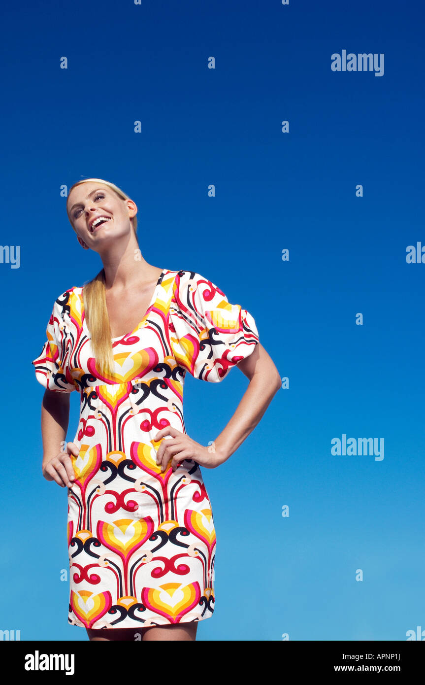 Young Woman in Colorful Dress Stock Photo - Alamy