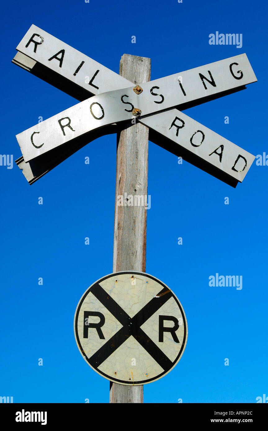 Railroad crossing sign with bright blue background, Kingston, New York ...