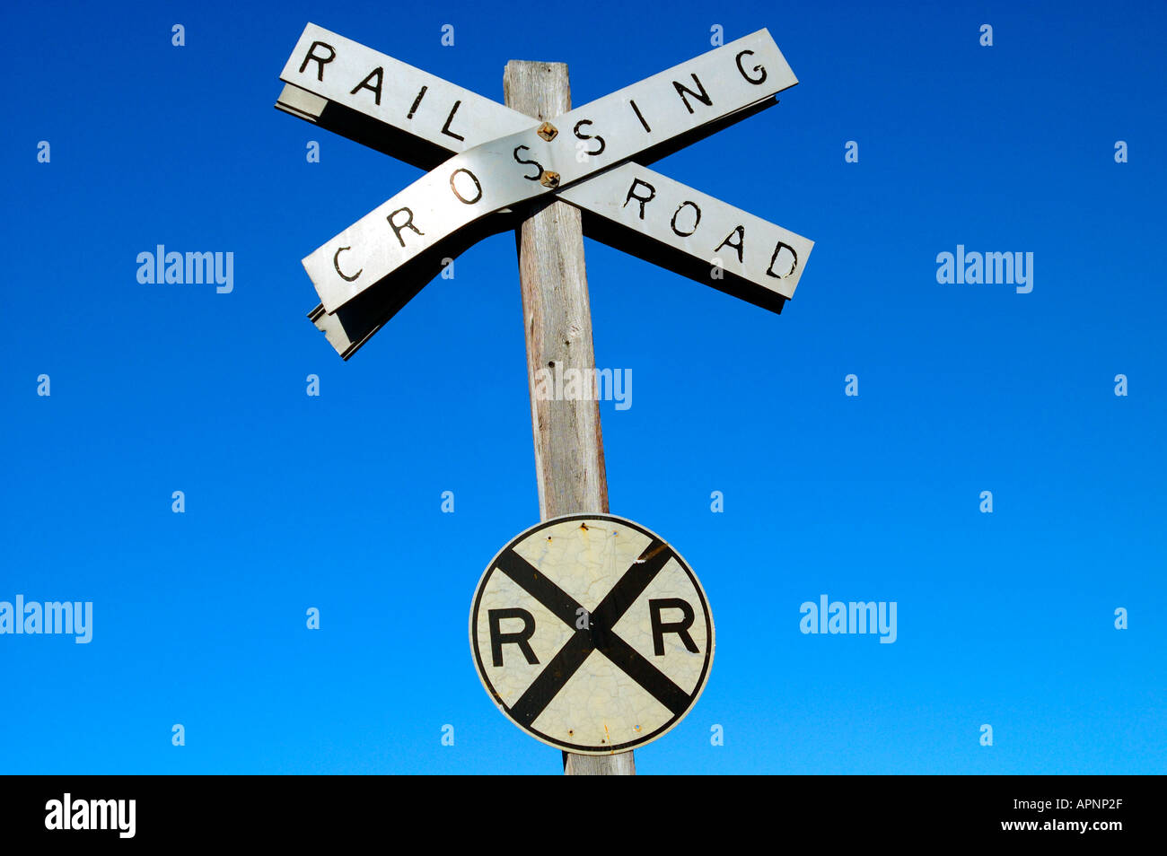 Railroad crossing sign bright blue hi-res stock photography and images ...