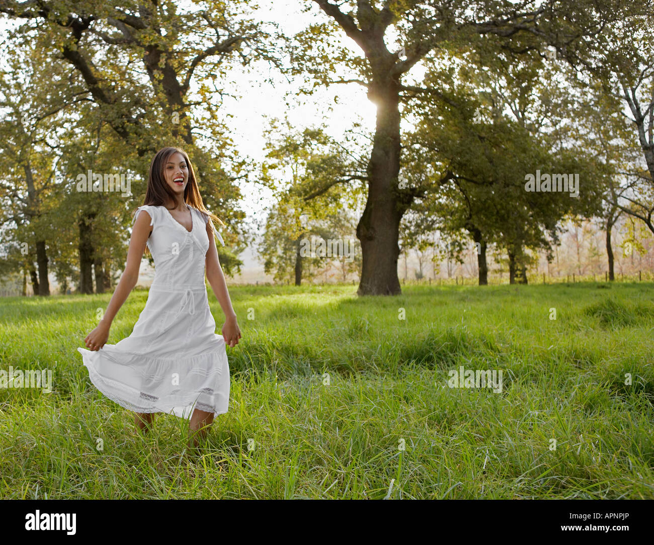 Teenage Girl in Field Stock Photo - Alamy