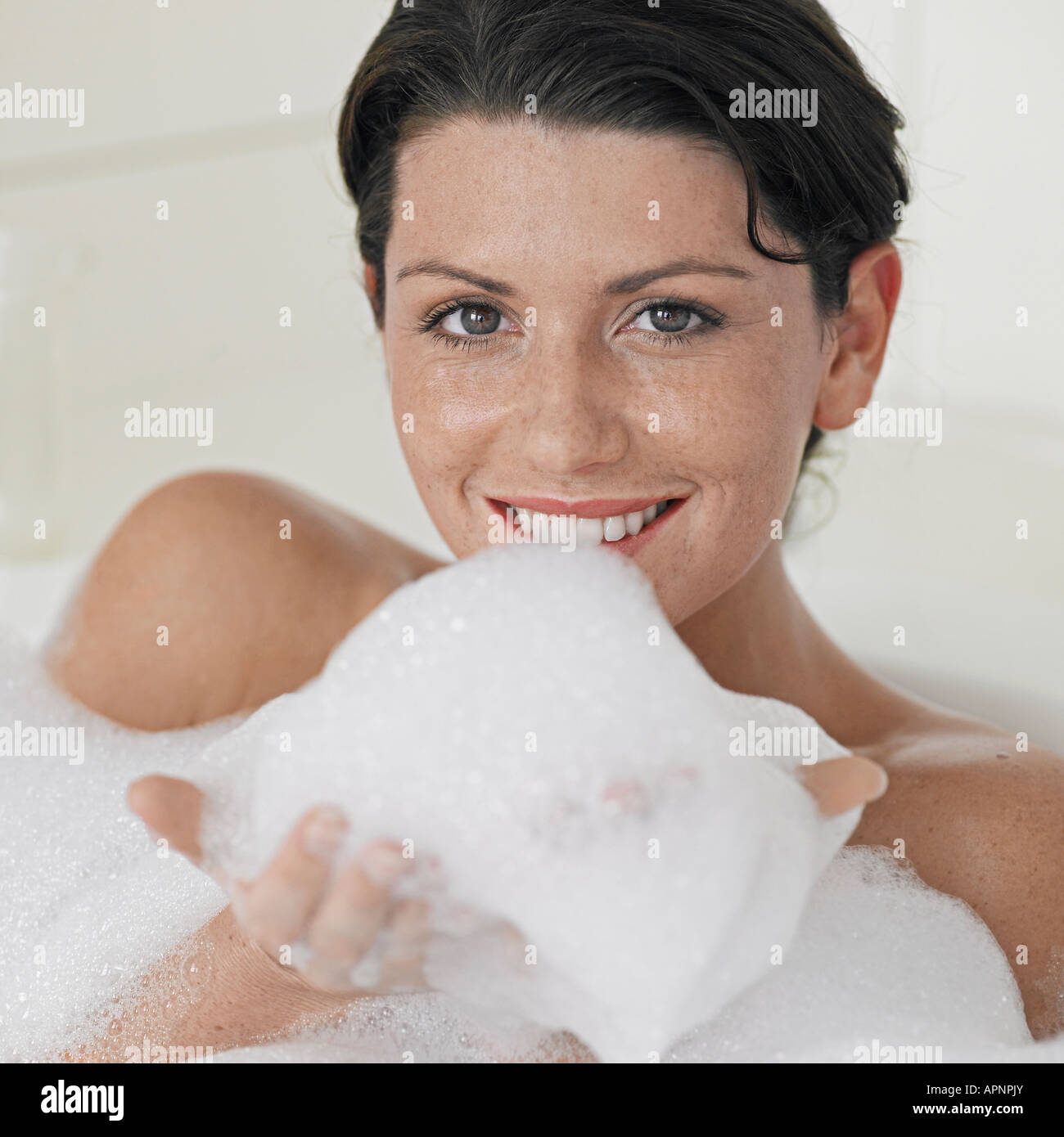 Mid Adult Woman Having Bath Stock Photo - Alamy