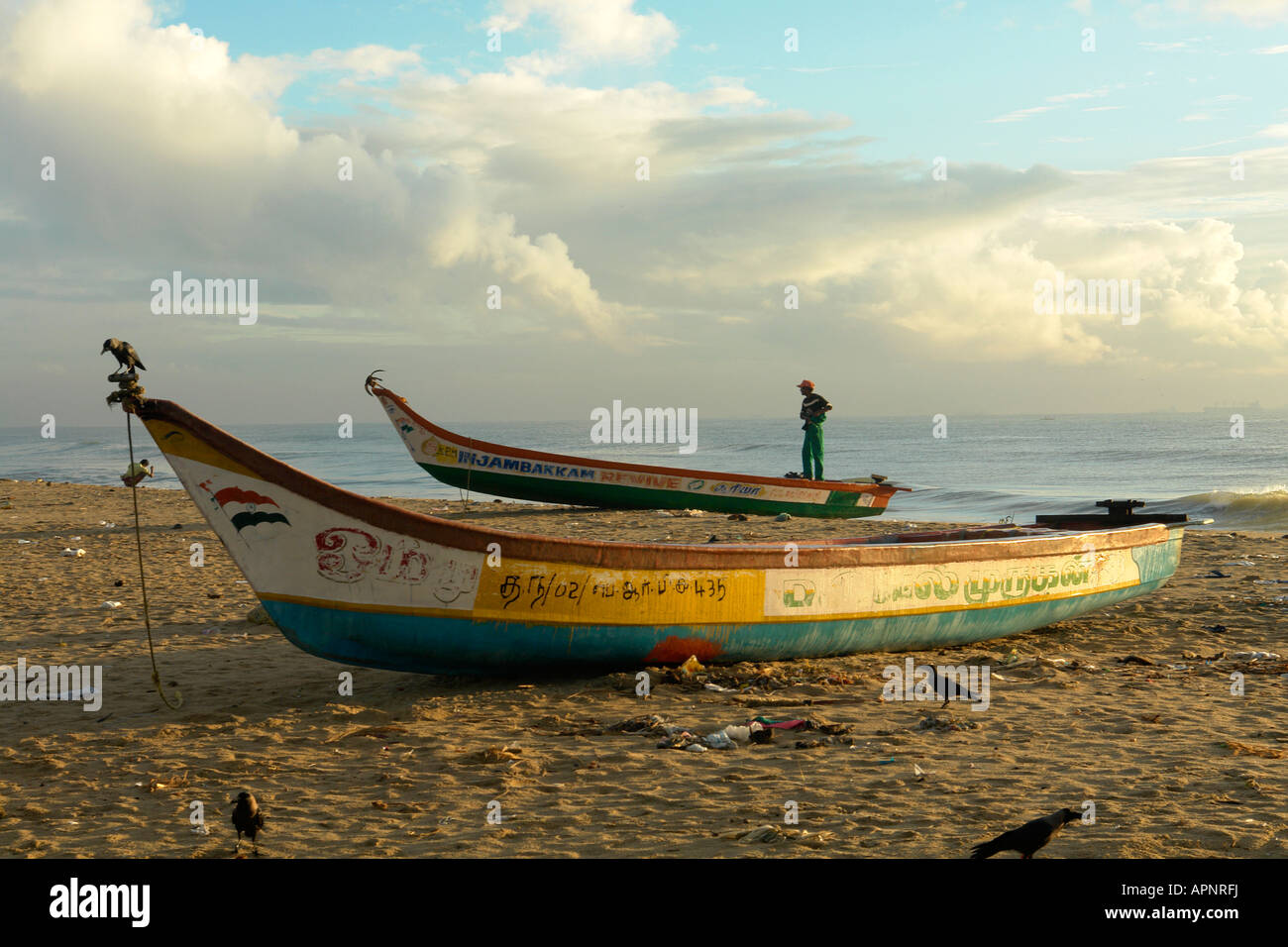 traditional indian fishing boats on the fishermans beach at chennai ...