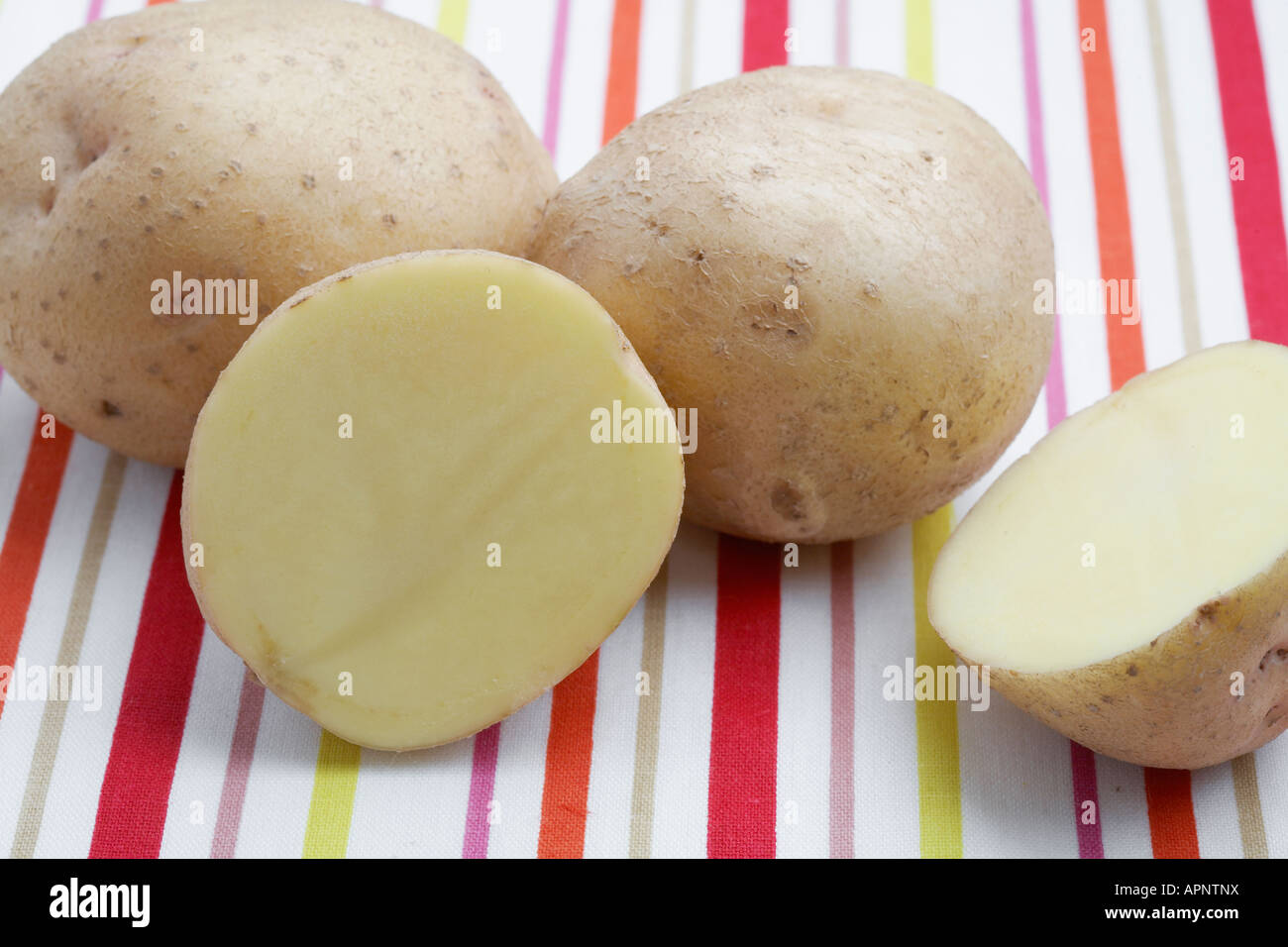 Four potatoes hi-res stock photography and images - Alamy
