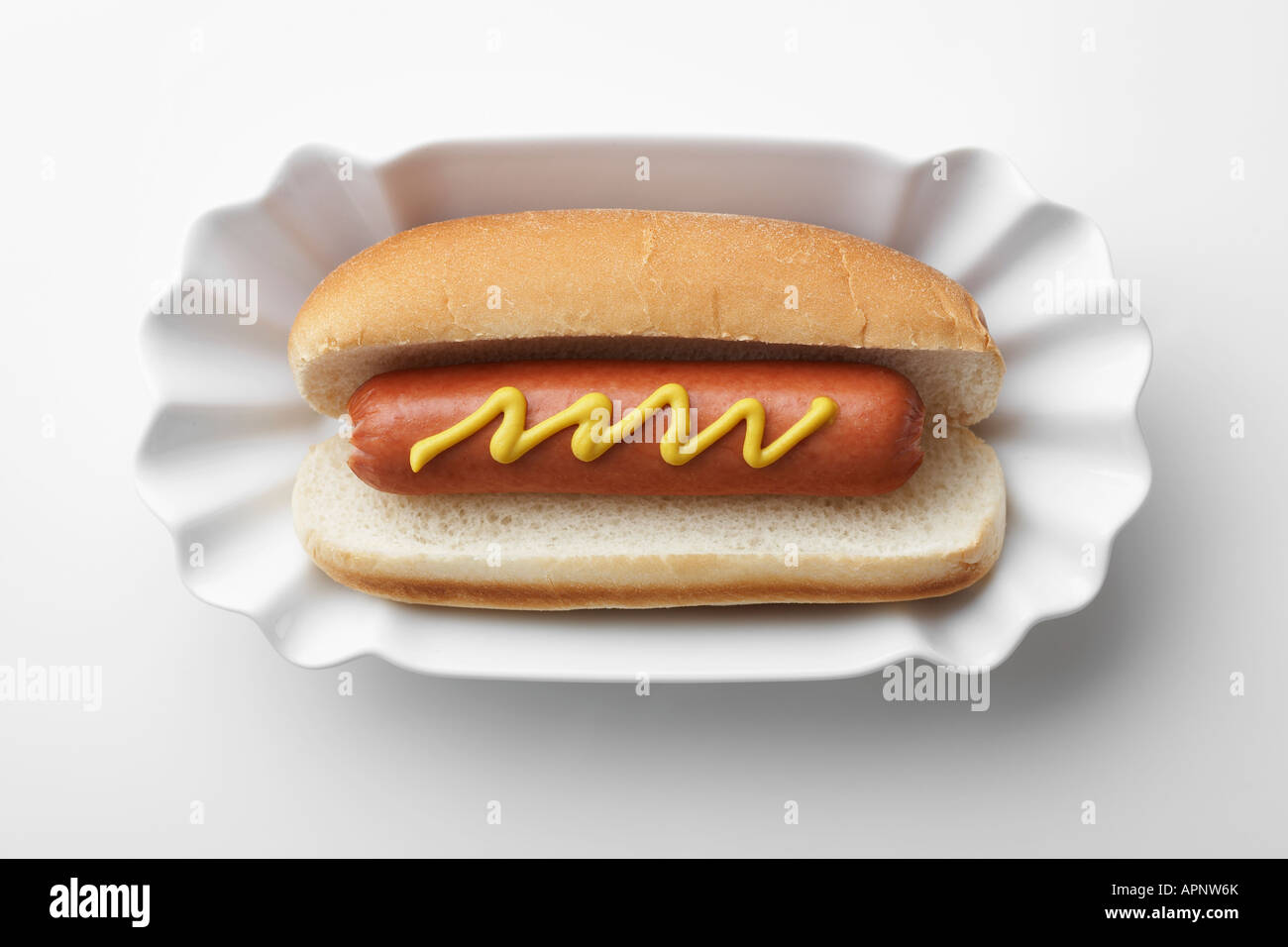Hot dog on plate Stock Photo - Alamy