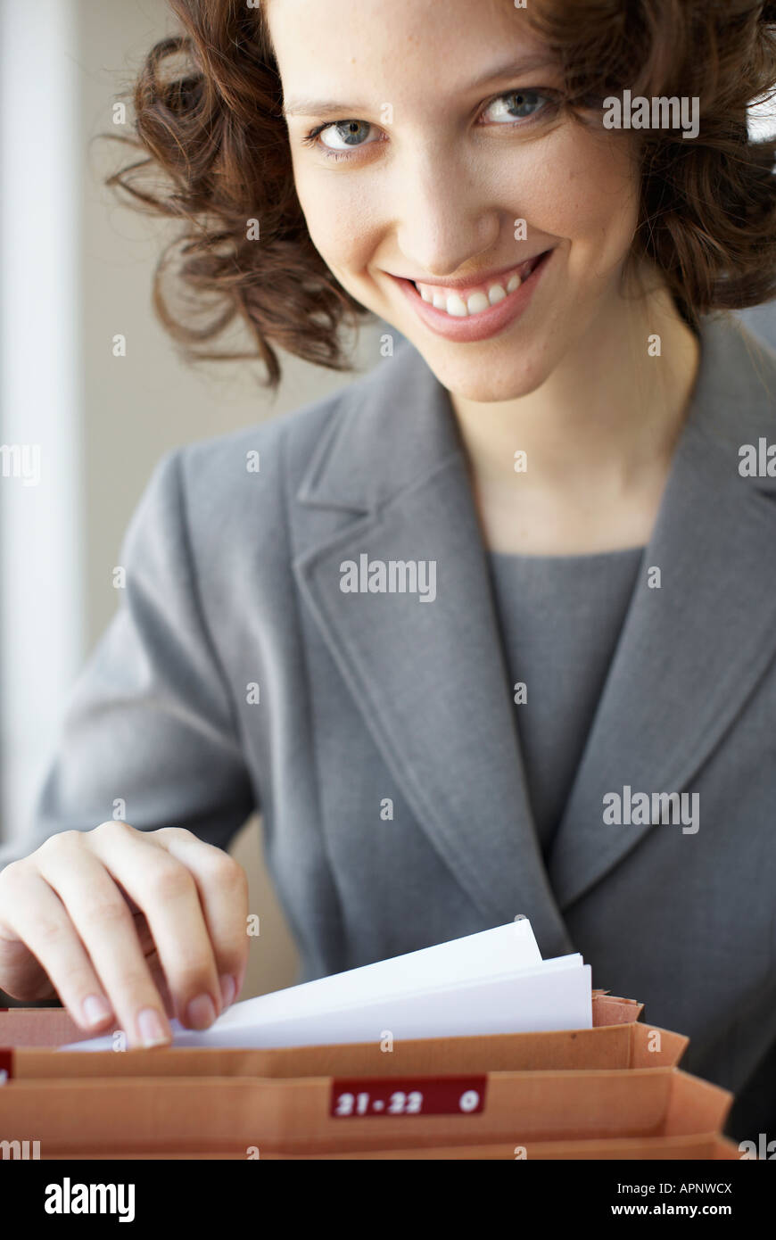 Looking through files hi-res stock photography and images - Alamy