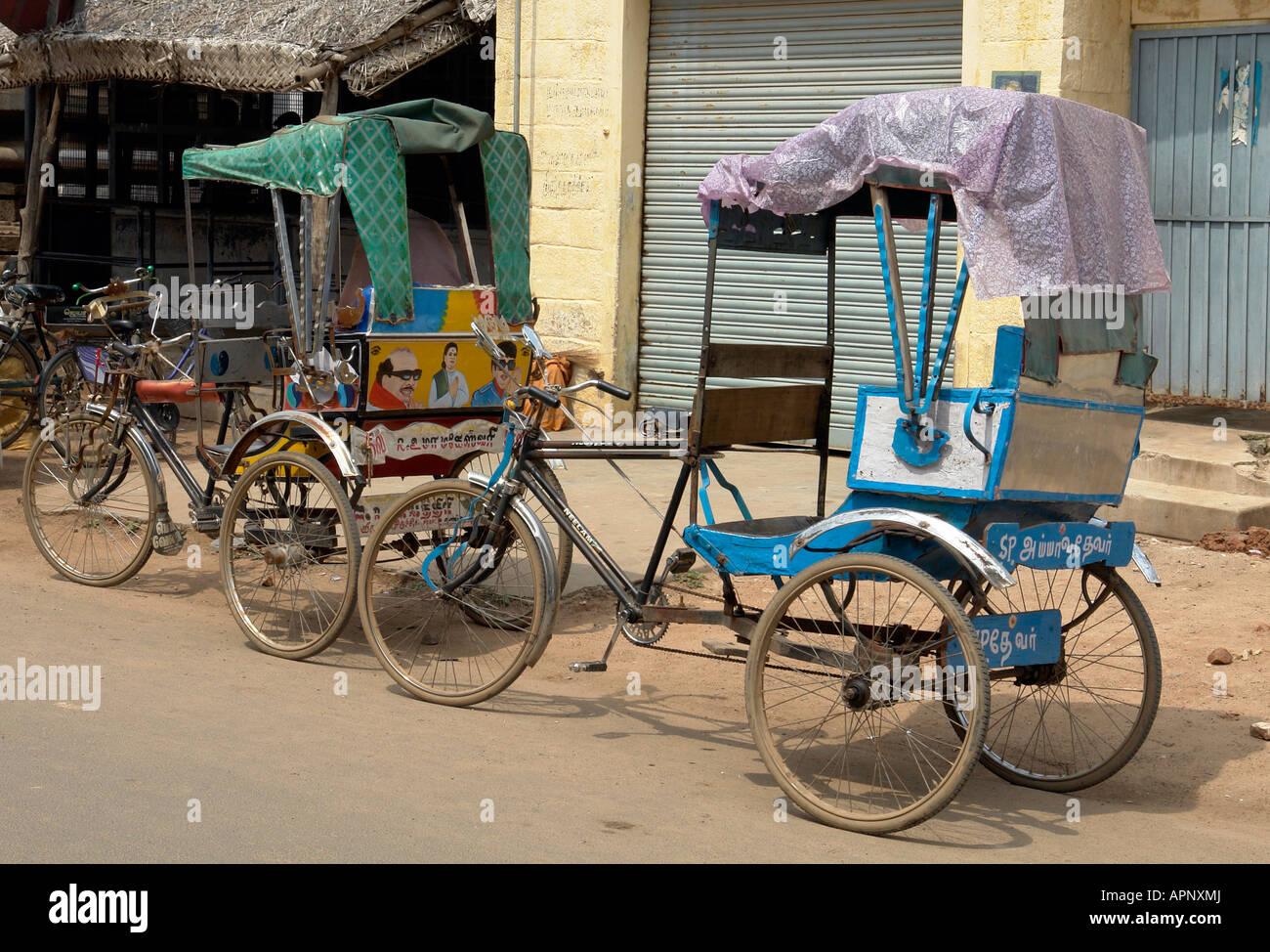 indian cycle rickshaws waiting for business in a trichy back street ...