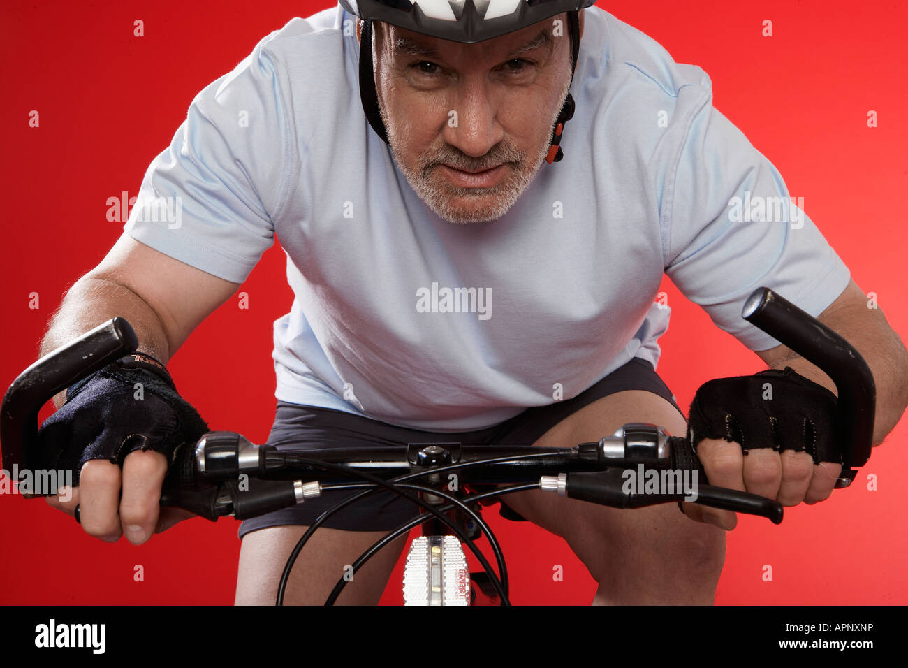 Senior male cyclist racing Stock Photo - Alamy