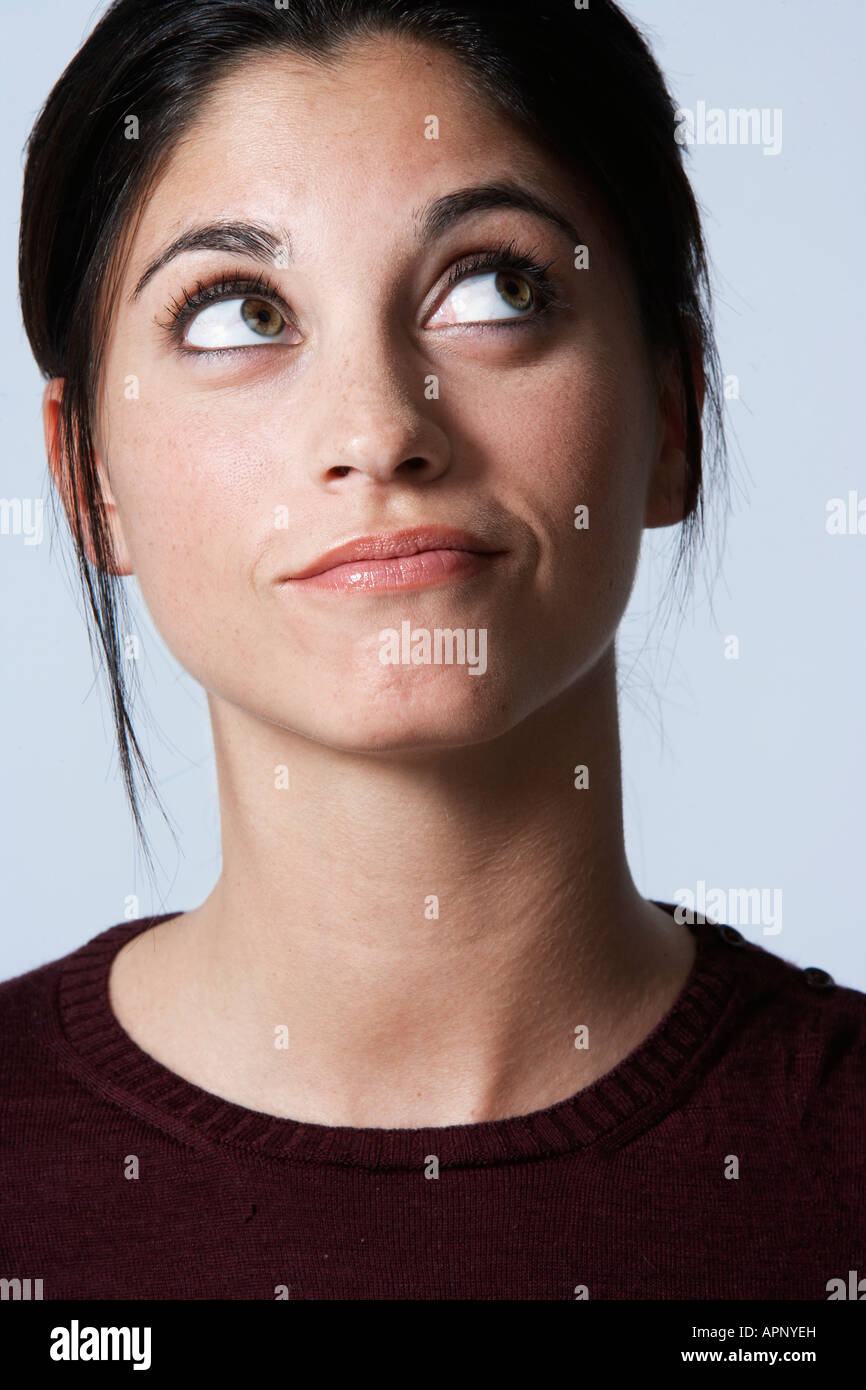 Young woman looking up Stock Photo - Alamy