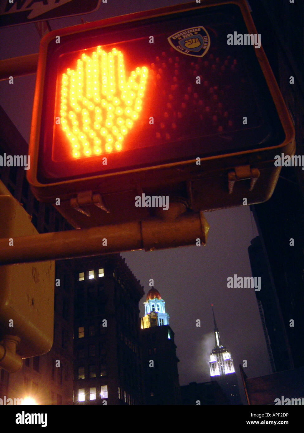 Night Scene of a Crosswalk Hand Signal and The Empire State Building in ...