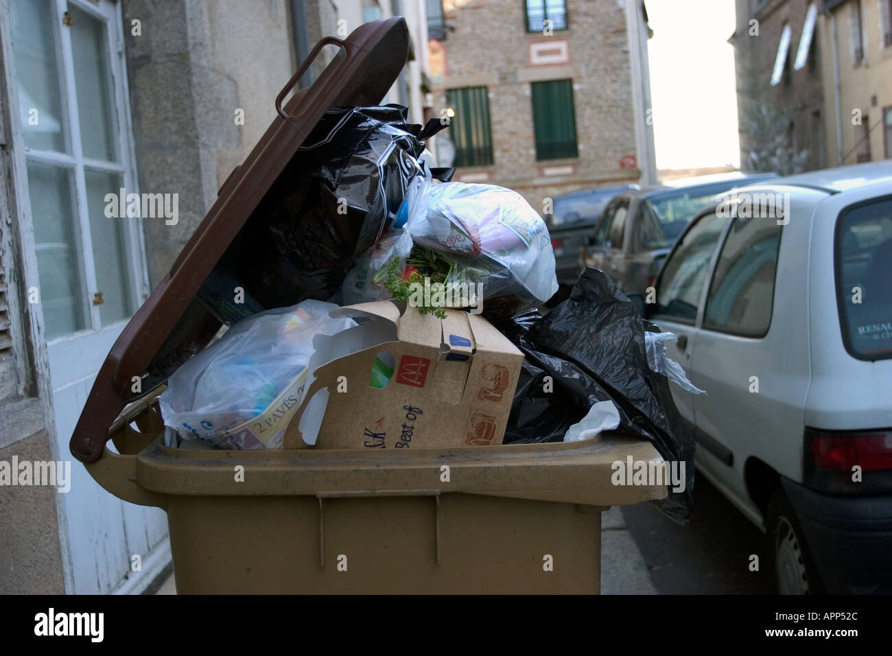 full bin in a street Stock Photo - Alamy
