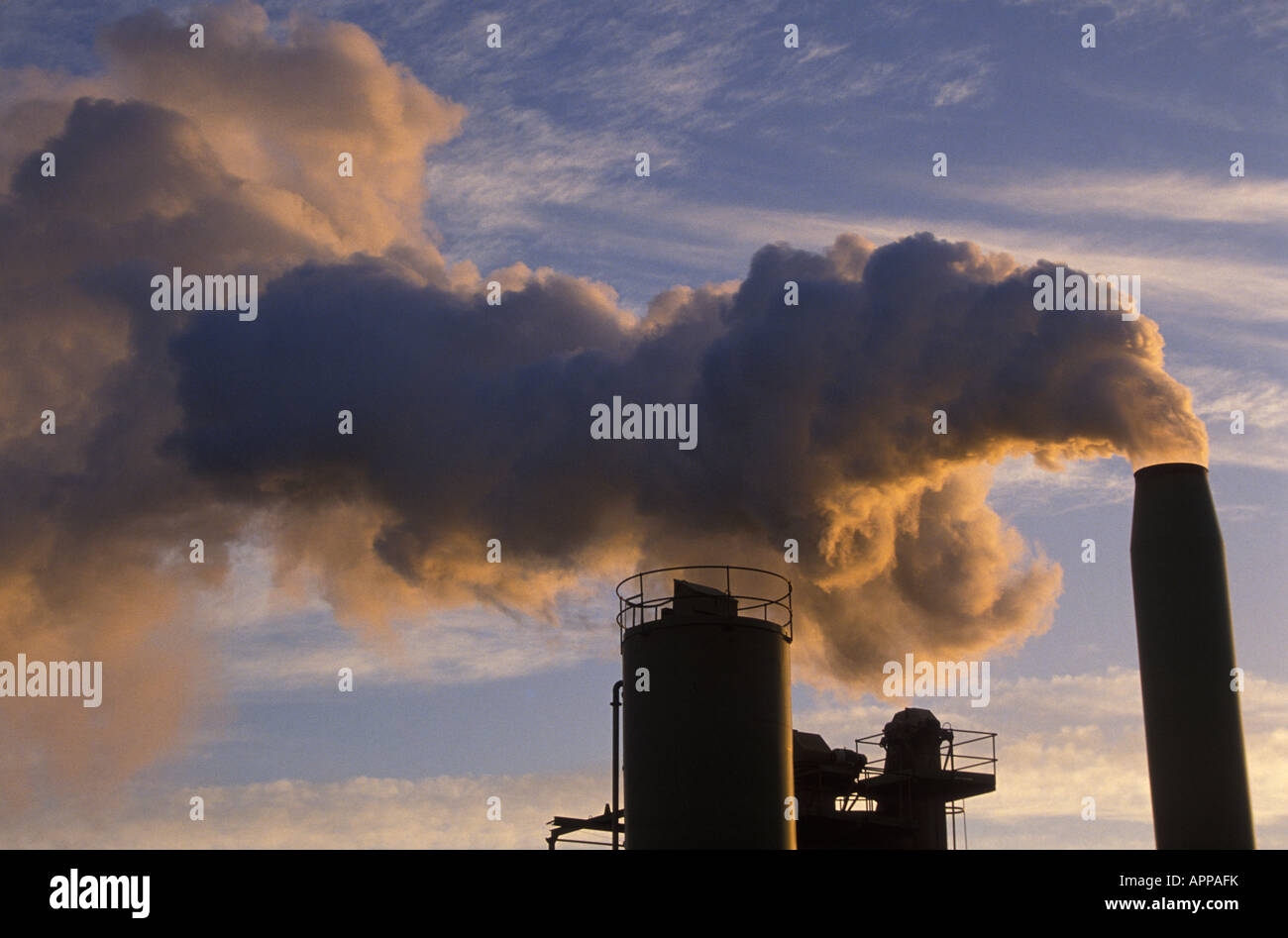 Smoke billowing out of tower Stock Photo - Alamy