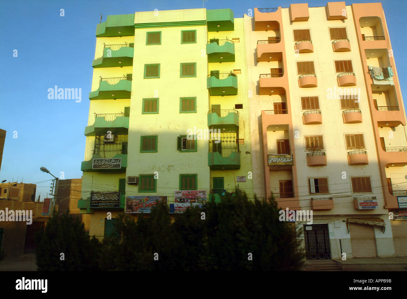View of an Egyptian apartment block from the train Stock Photo - Alamy