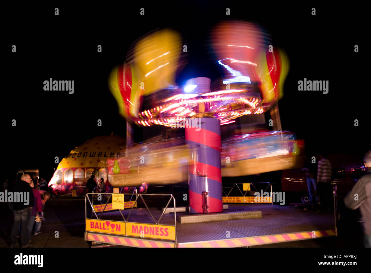 Funfair ride at night Stock Photo - Alamy