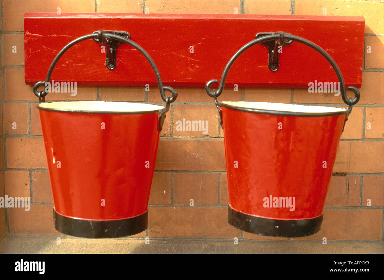 Two fire buckets hanging on the Great Central Railway Stock Photo - Alamy