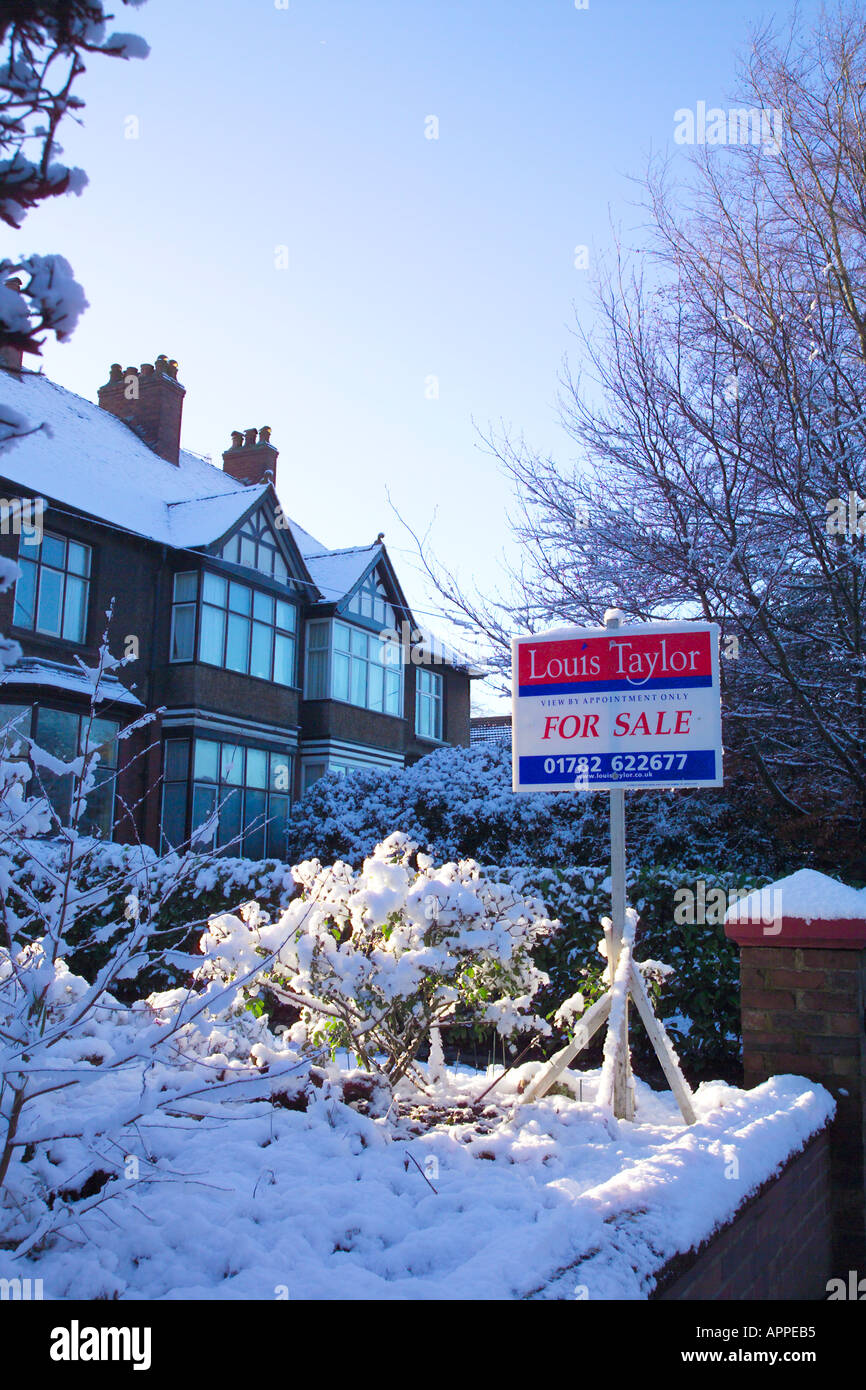 Estate Agents for Sale Sign in Snow Stock Photo - Alamy