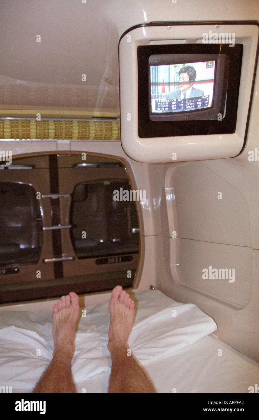 Interior of Japanese Capsule or Pod hotel in Tokyo from perspective of ...