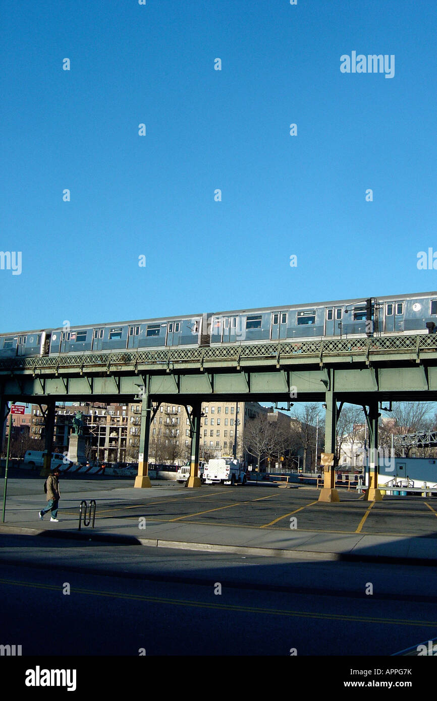 Urban Scene of an Elevated MTA Subway Train in Brooklyn New York City ...