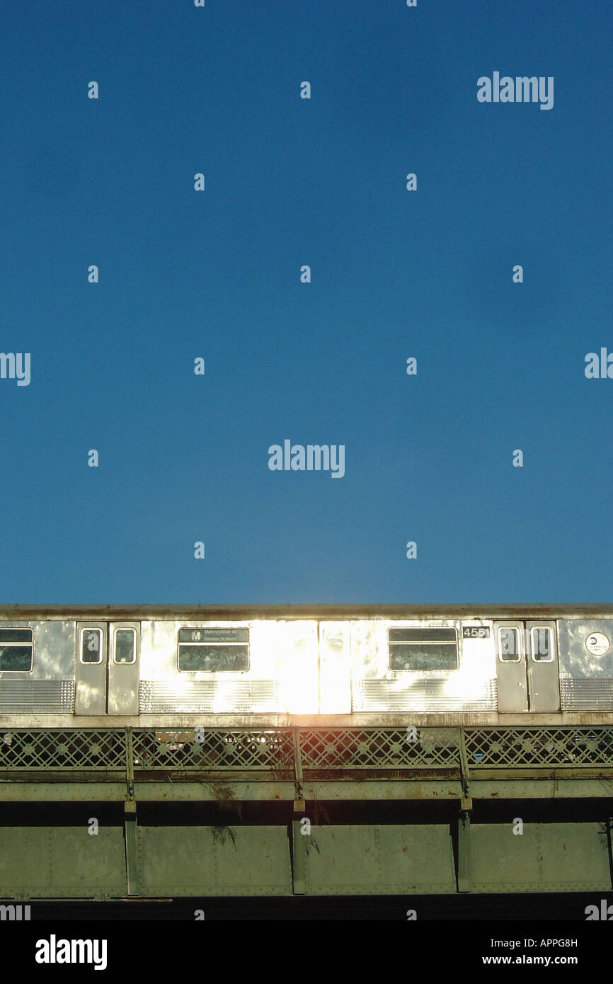 Urban Scene of an Elevated MTA Subway Train in Brooklyn New York City ...