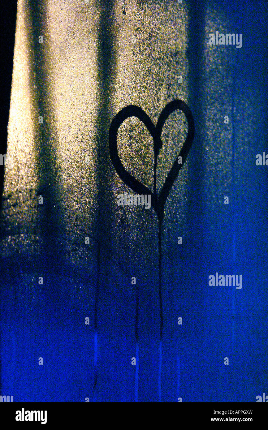 Heart Drawn on a Misty Window Which is Being Back Lit by White and Blue ...