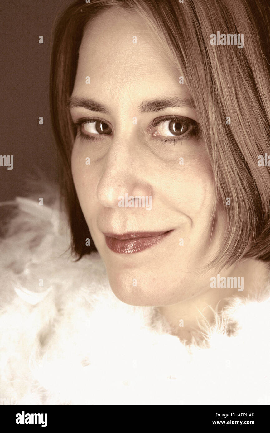 Woman wearing feather boa hi-res stock photography and images - Alamy