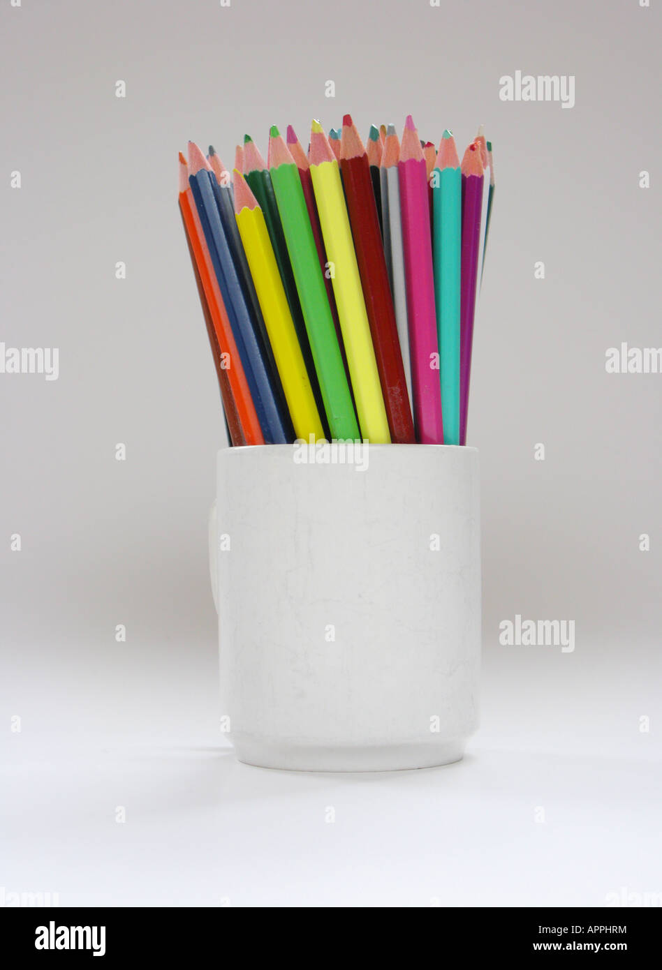 Colored pencils in a jug Stock Photo - Alamy