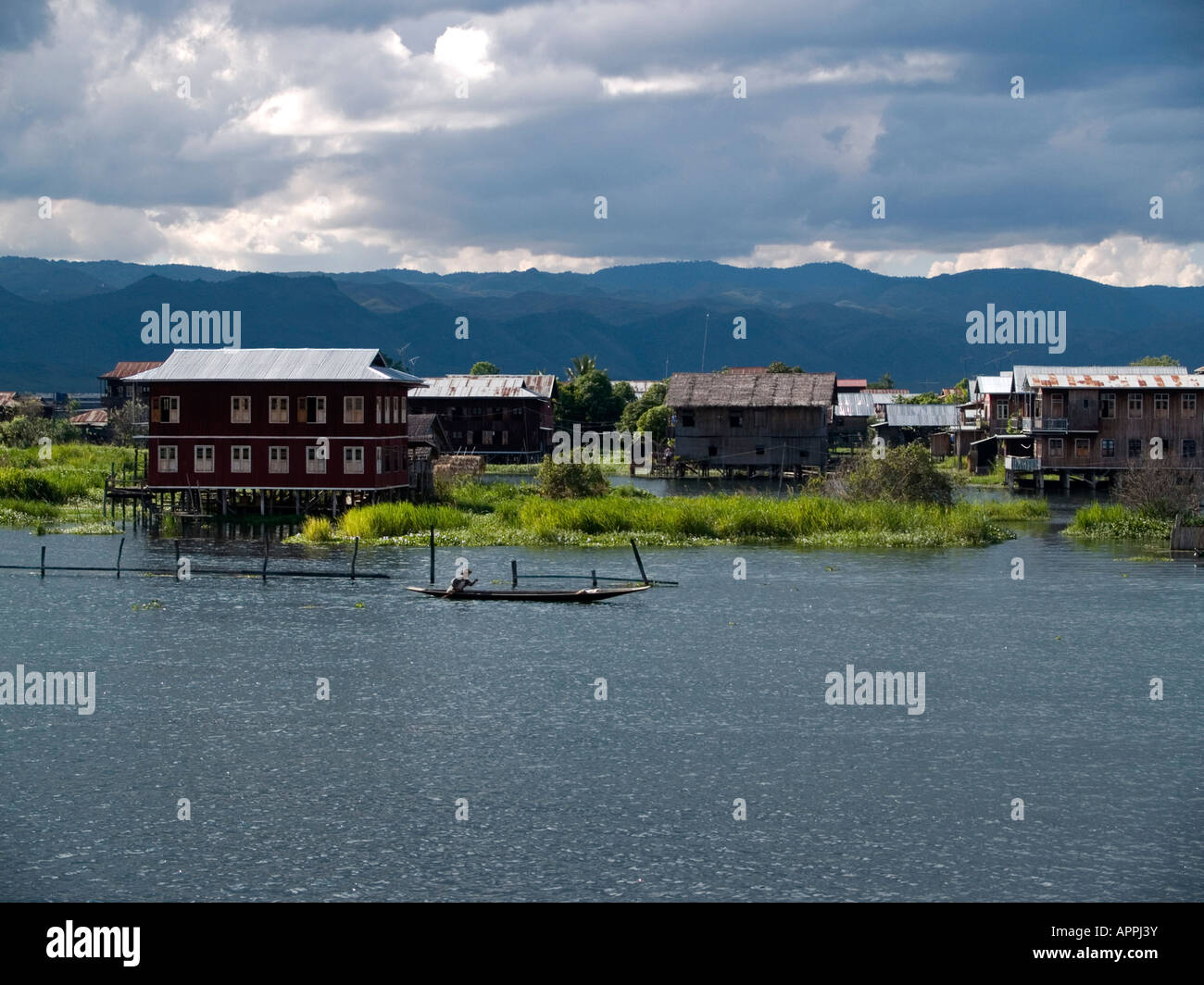 traditional homes along the beautiful scenery of Inle Lake in Myanmar ...
