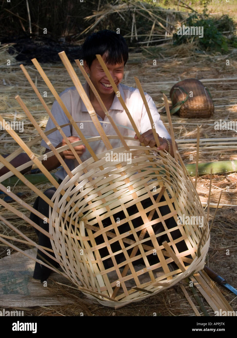 Burmese man making a basket near Inle Lake in Myanmar Stock Photo - Alamy