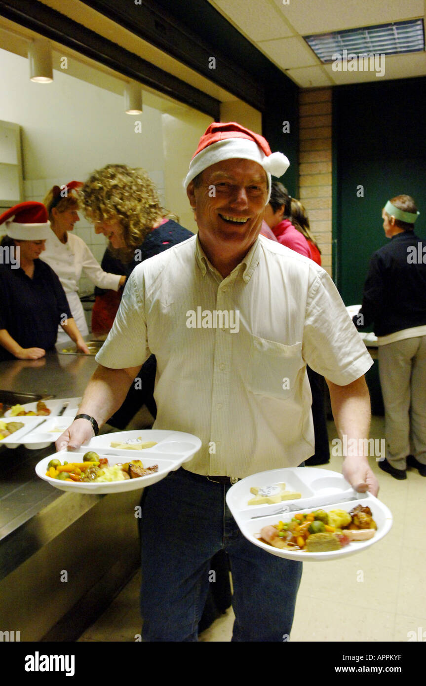 school canteen dinner lunch christmas party teachers male man santa hat ...