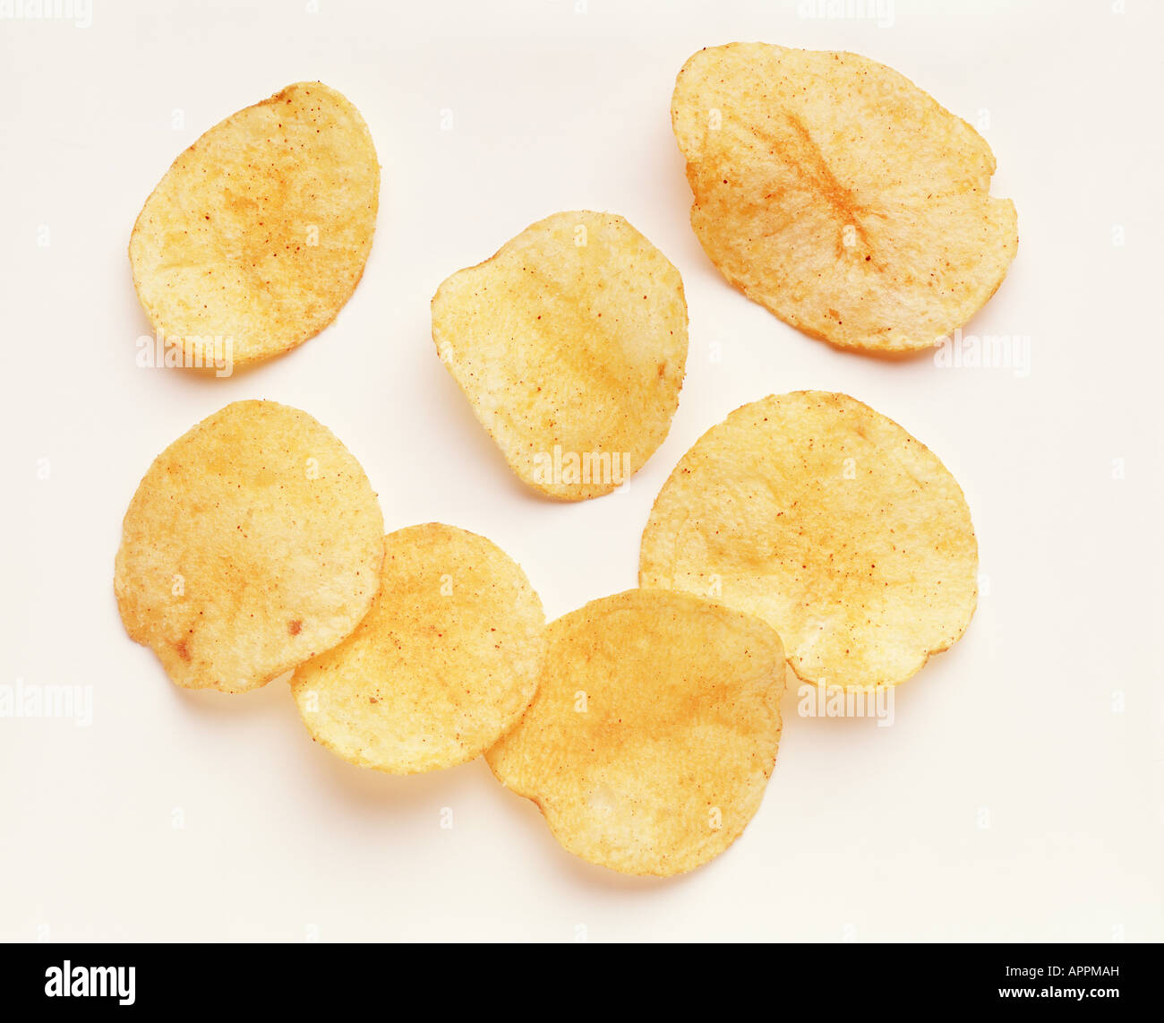 Fresh cut potato chips snack food unhealthy Stock Photo - Alamy